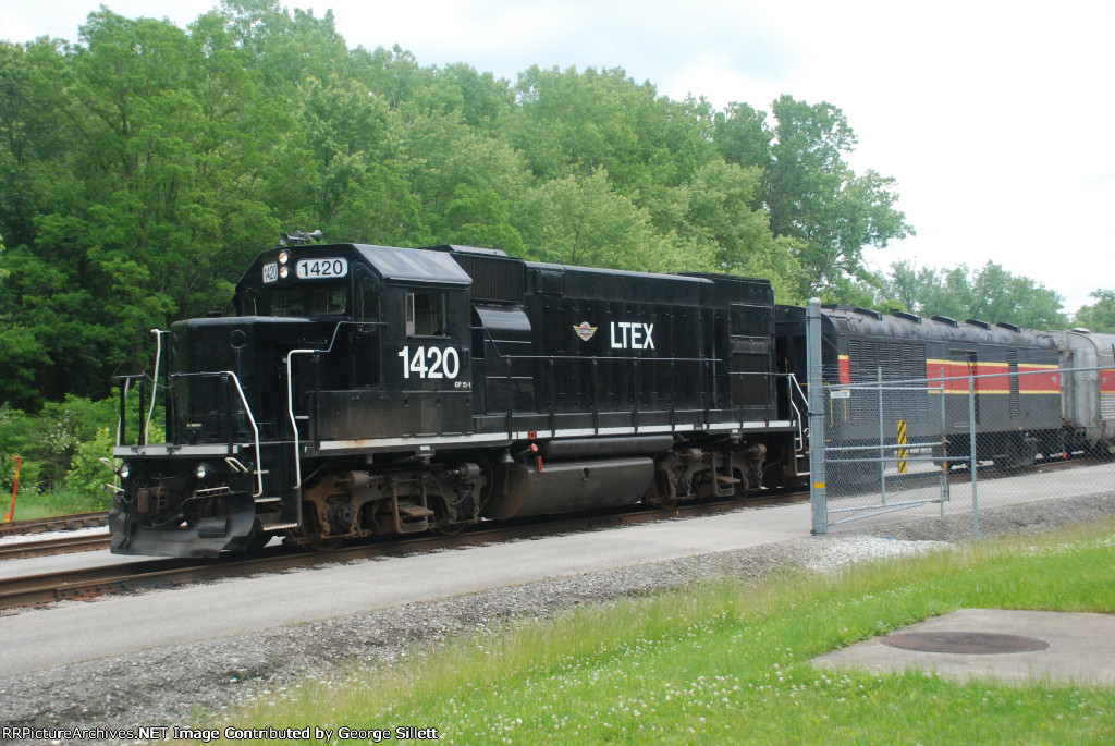 1420 gets ready to tie onto the scenic train again after picking up the power car.